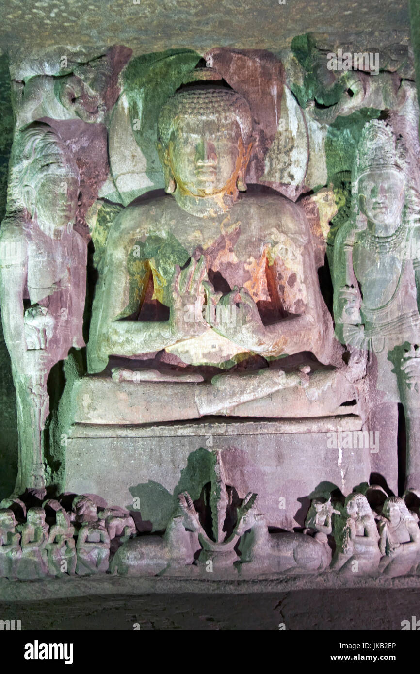 Statue of Buddha inside one of many ancient rock carved Buddhist cave ...