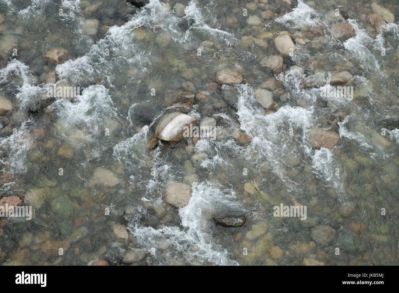 Rocks in a stream Stock Photo - Alamy