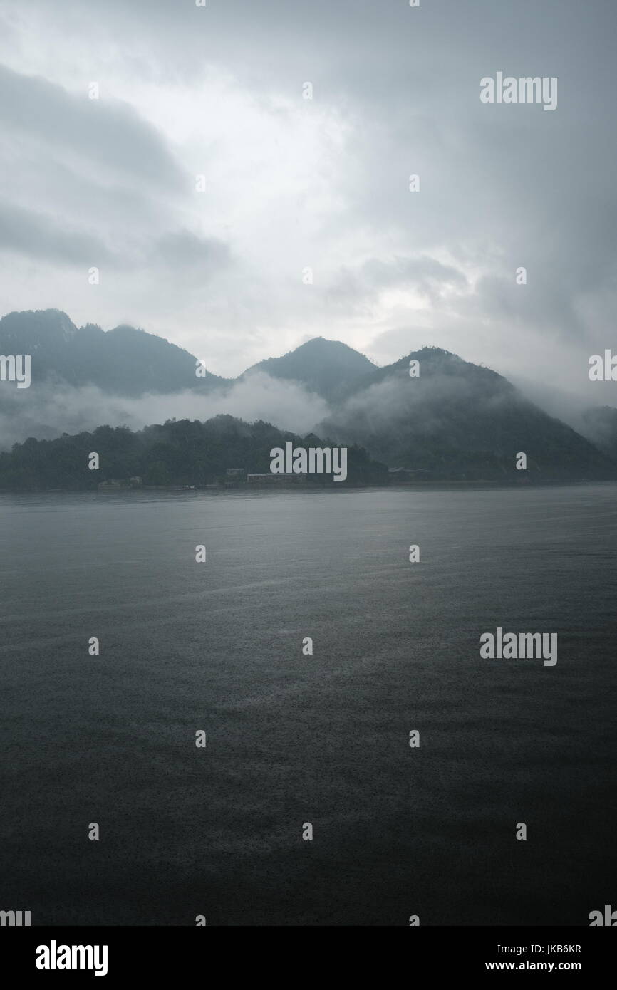 Misty island after the rain Stock Photo - Alamy