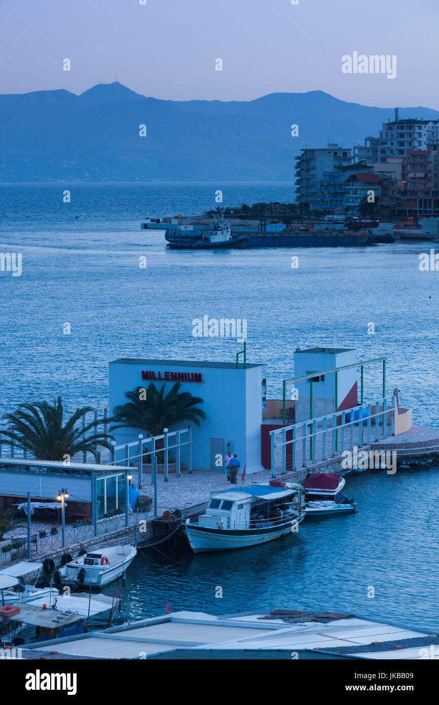 Albania, Albanian Riviera, Saranda, elevated harbor view, dusk Stock ...
