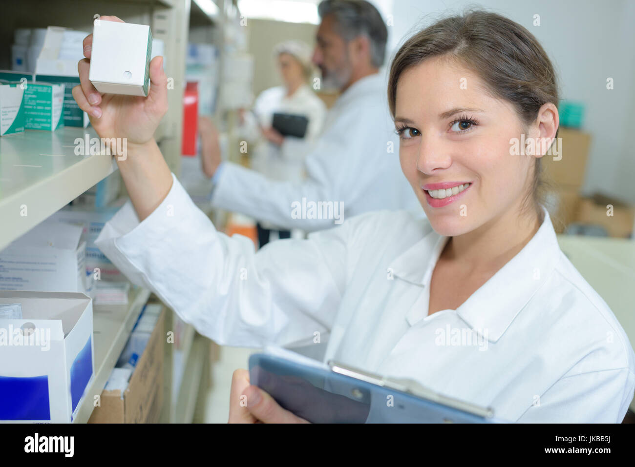 portrait of female pharmacists working in modern farmacy Stock Photo ...