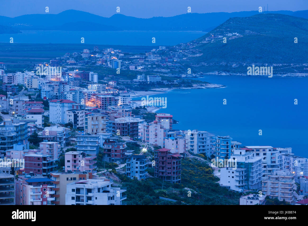 Albania, Albanian Riviera, Saranda, elevated city view, dusk Stock ...