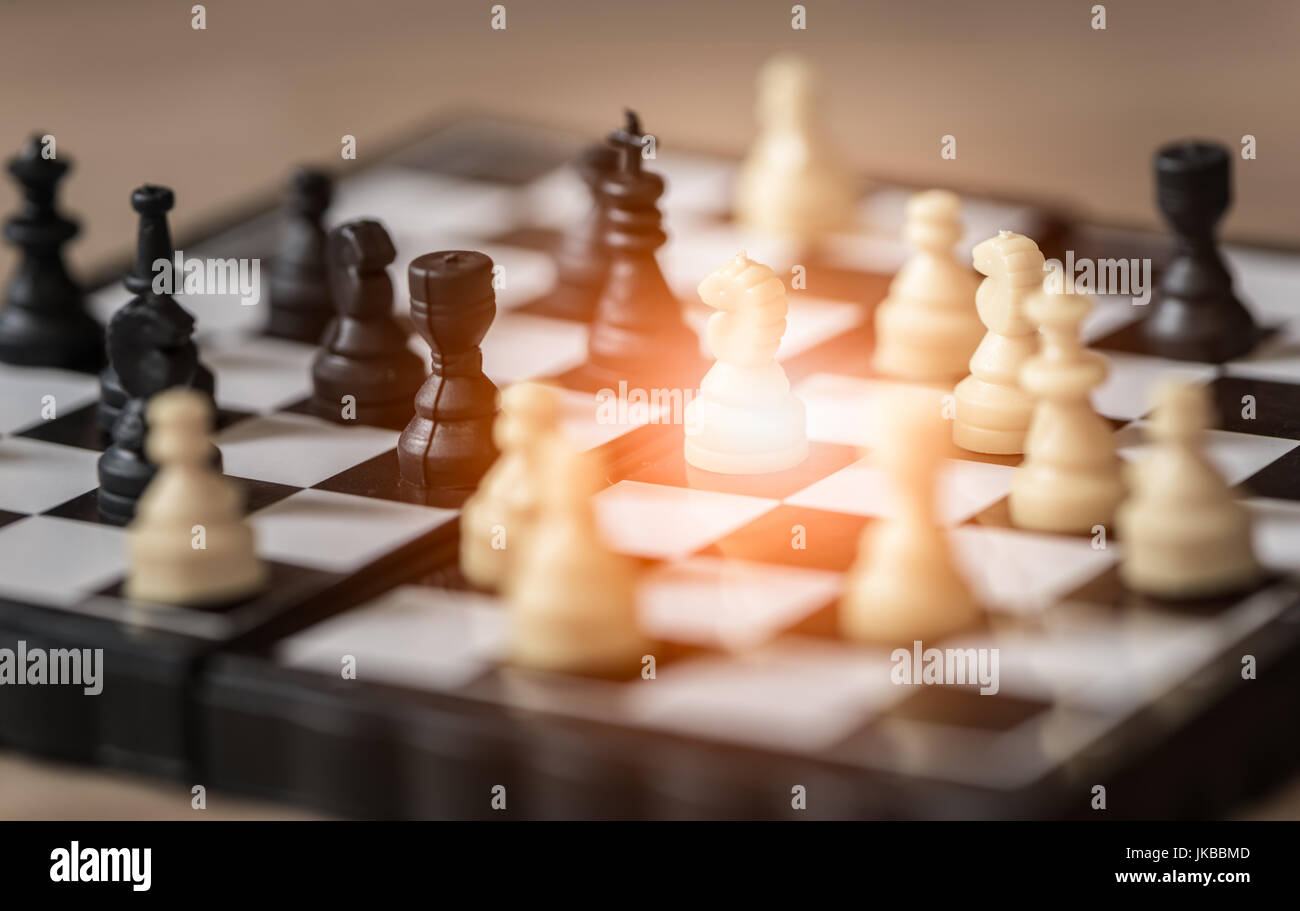 Small knight ,chess on board business concept Stock Photo - Alamy