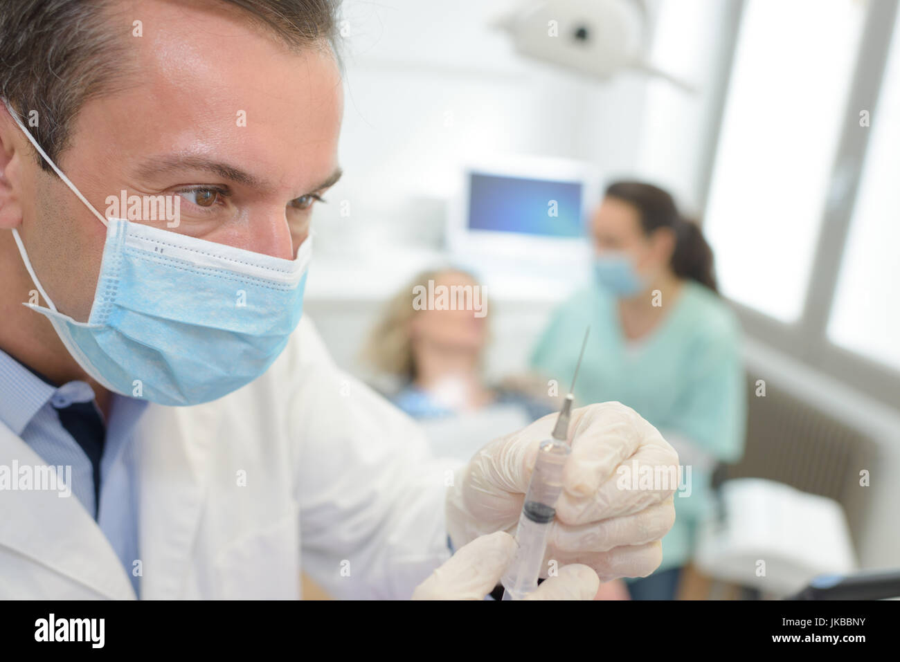 doctor with syringe Stock Photo - Alamy