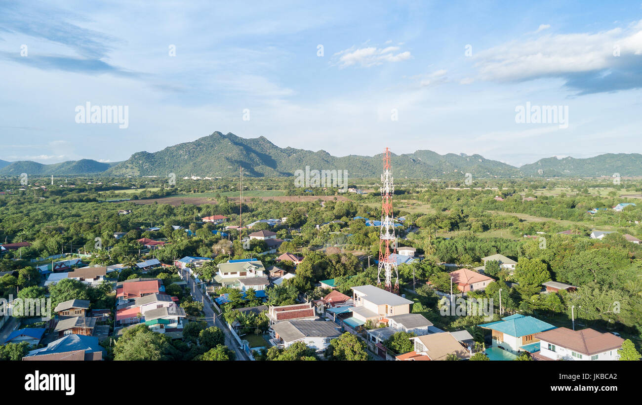 aerial view of tower mobile phone in village, communication technology ...