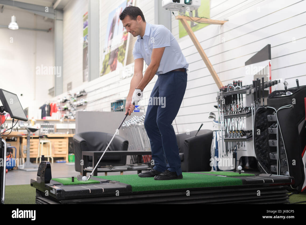 playing golf at the office Stock Photo - Alamy