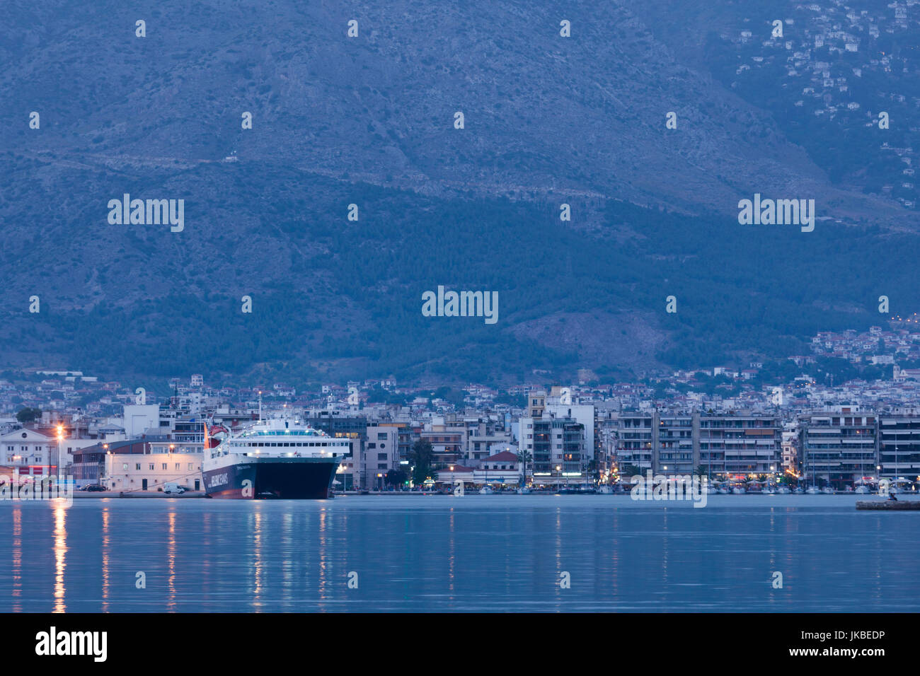 Greece, Thessaly Region, Pelion Peninsula, Volos, commercial port, dusk ...