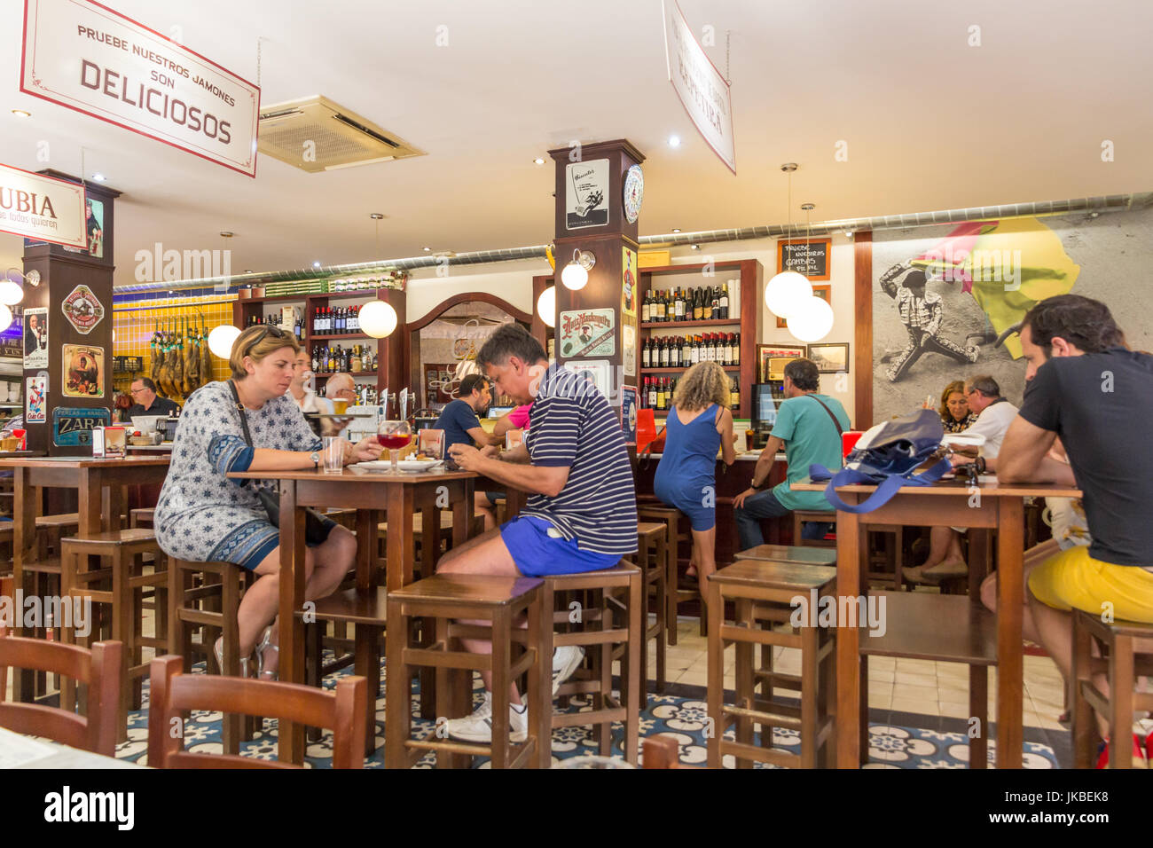 People eating tapas bar in hi-res stock photography and images - Alamy