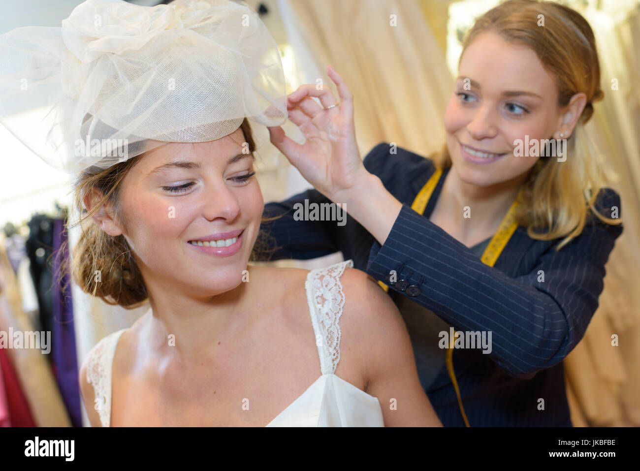 Wedding dress shop assistant hi-res stock photography and images - Alamy