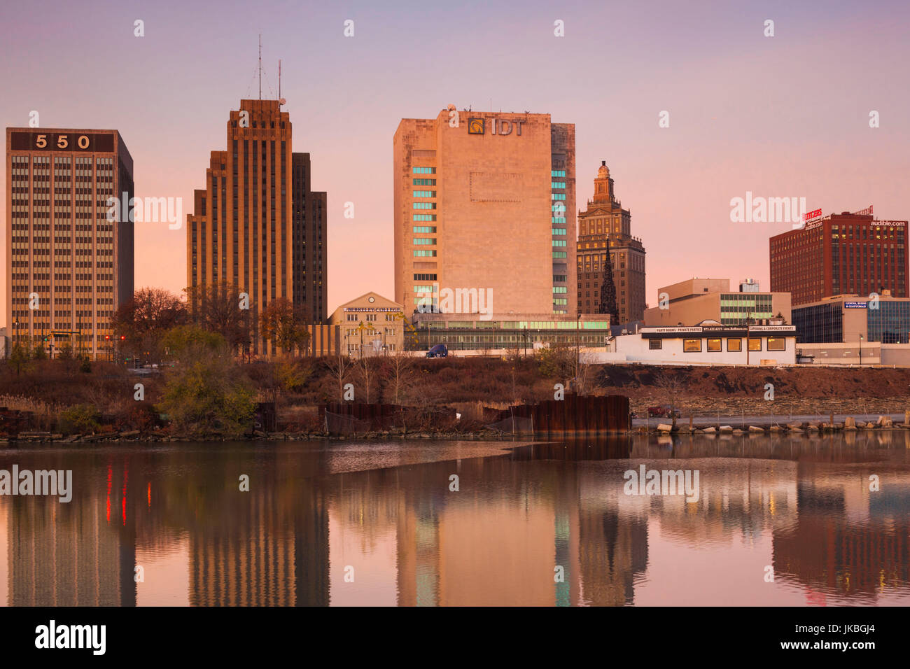 USA, New Jersey, Newark, city skyline from Passaic River, dawn Stock ...