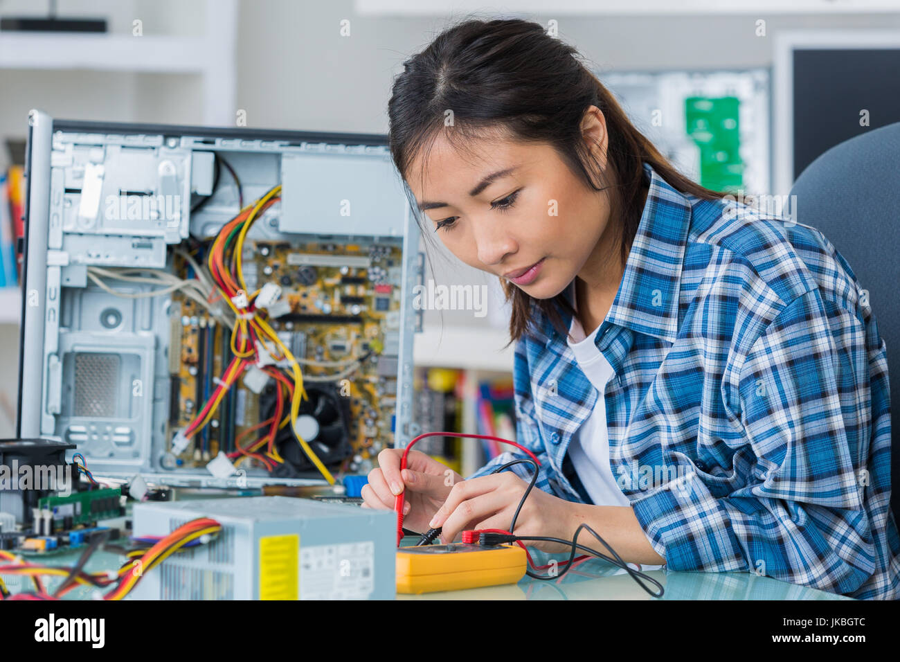 student girl in technology fixug computer hard drive Stock Photo - Alamy
