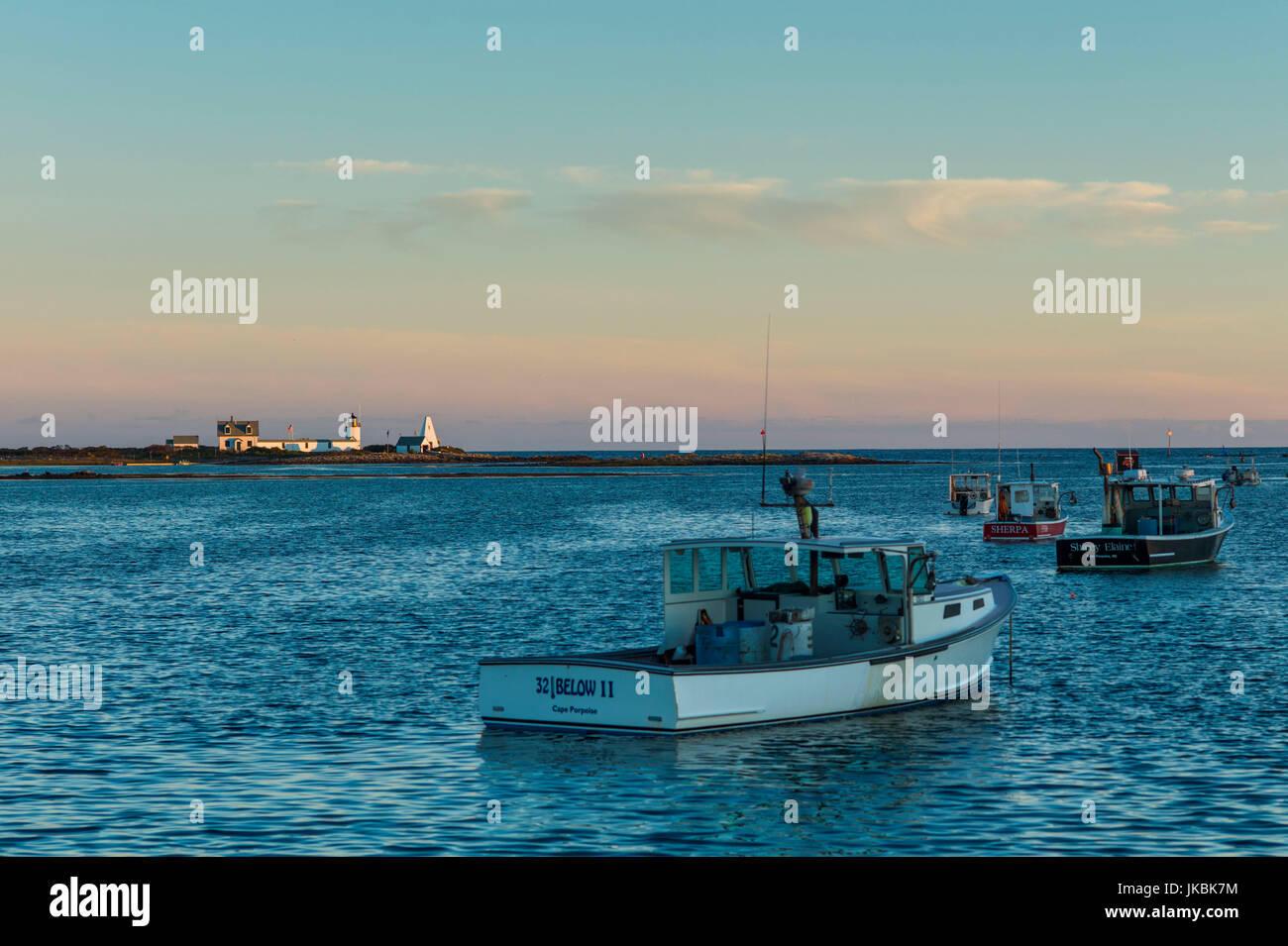 USA, Maine, Biddeford Pool, Harbor view towards Wood Island Light, dusk ...