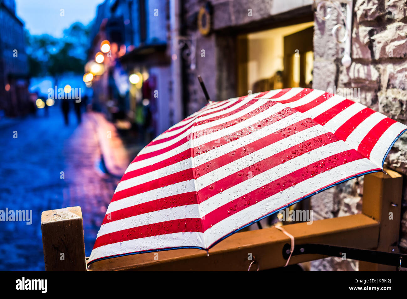 Red and white umbrella hi-res stock photography and images - Alamy