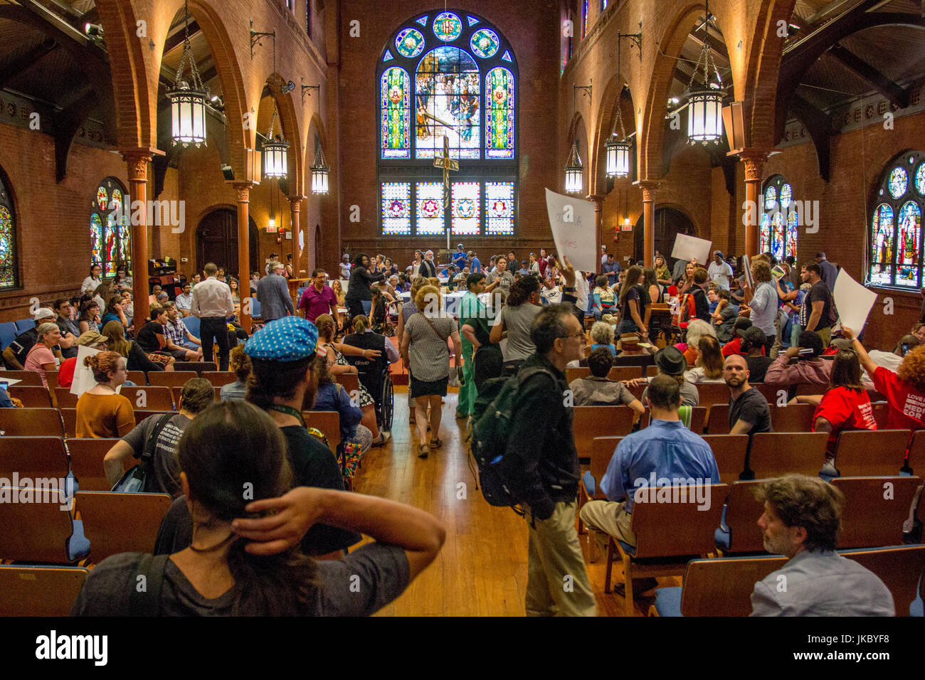 Hundreds of demonstrators gather at St. Mark's Episcopal Church near ...