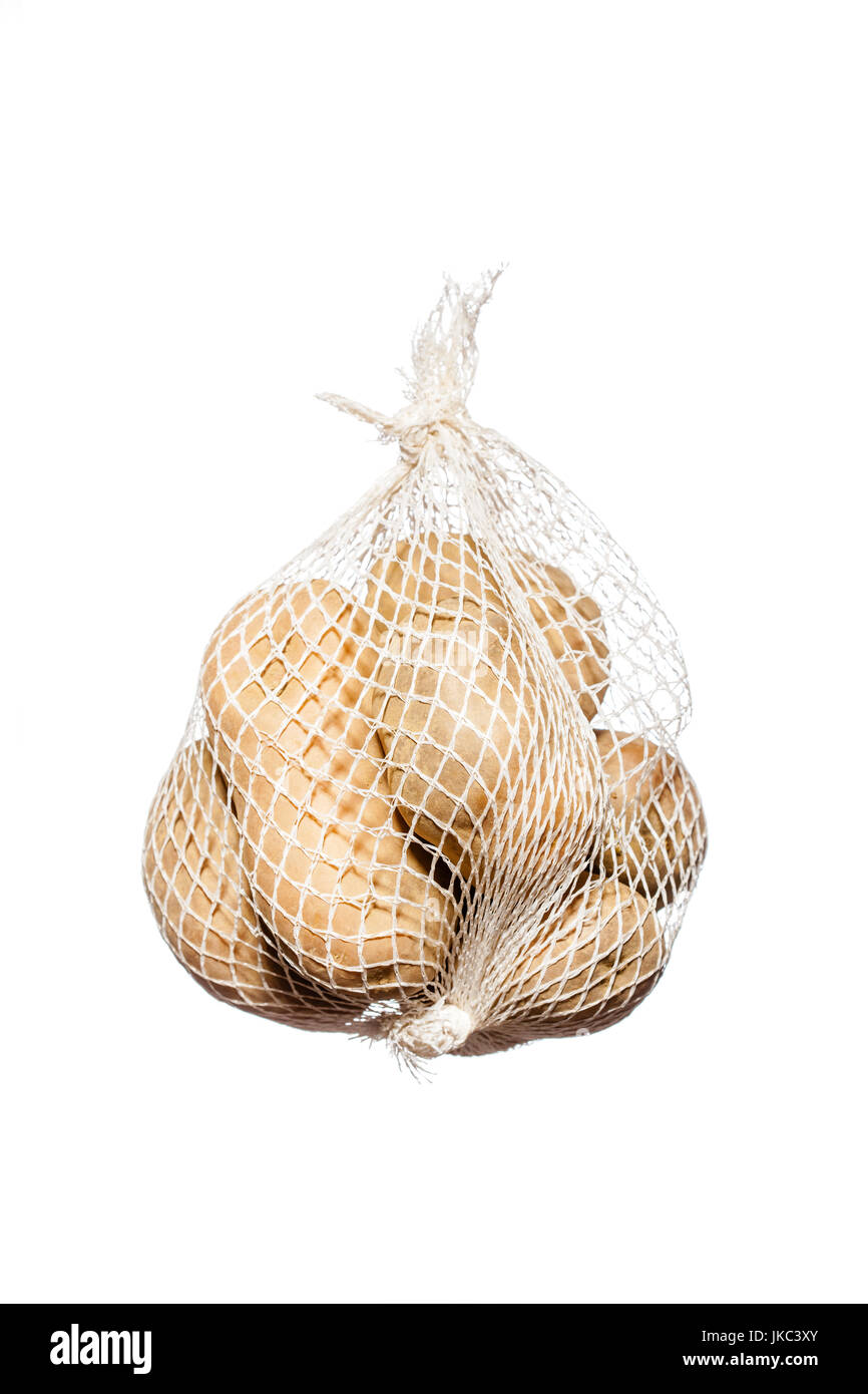 bunch fresh potatoes in a white mesh bag Stock Photo - Alamy