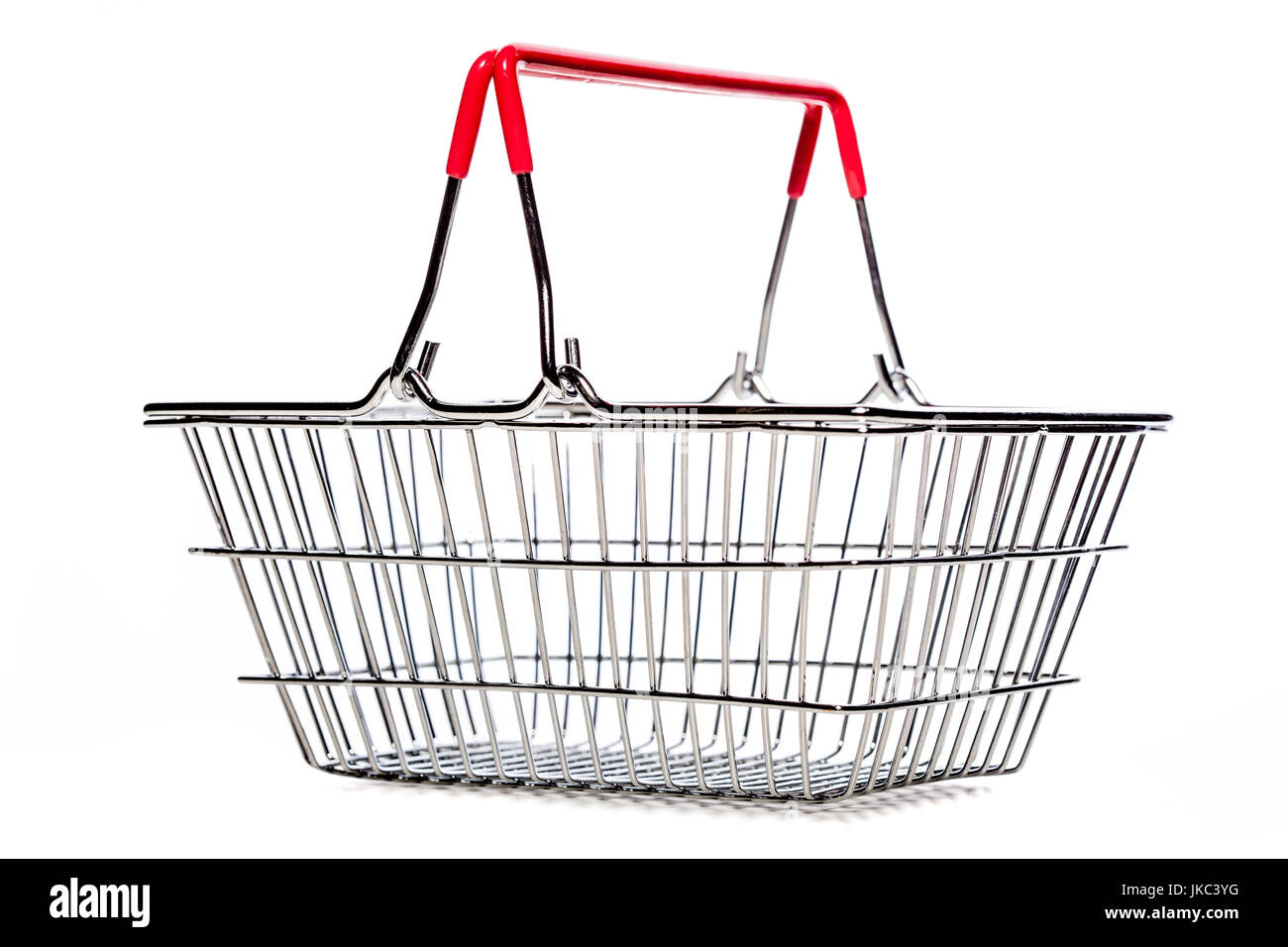 tiny metal shopping basket against white background Stock Photo - Alamy