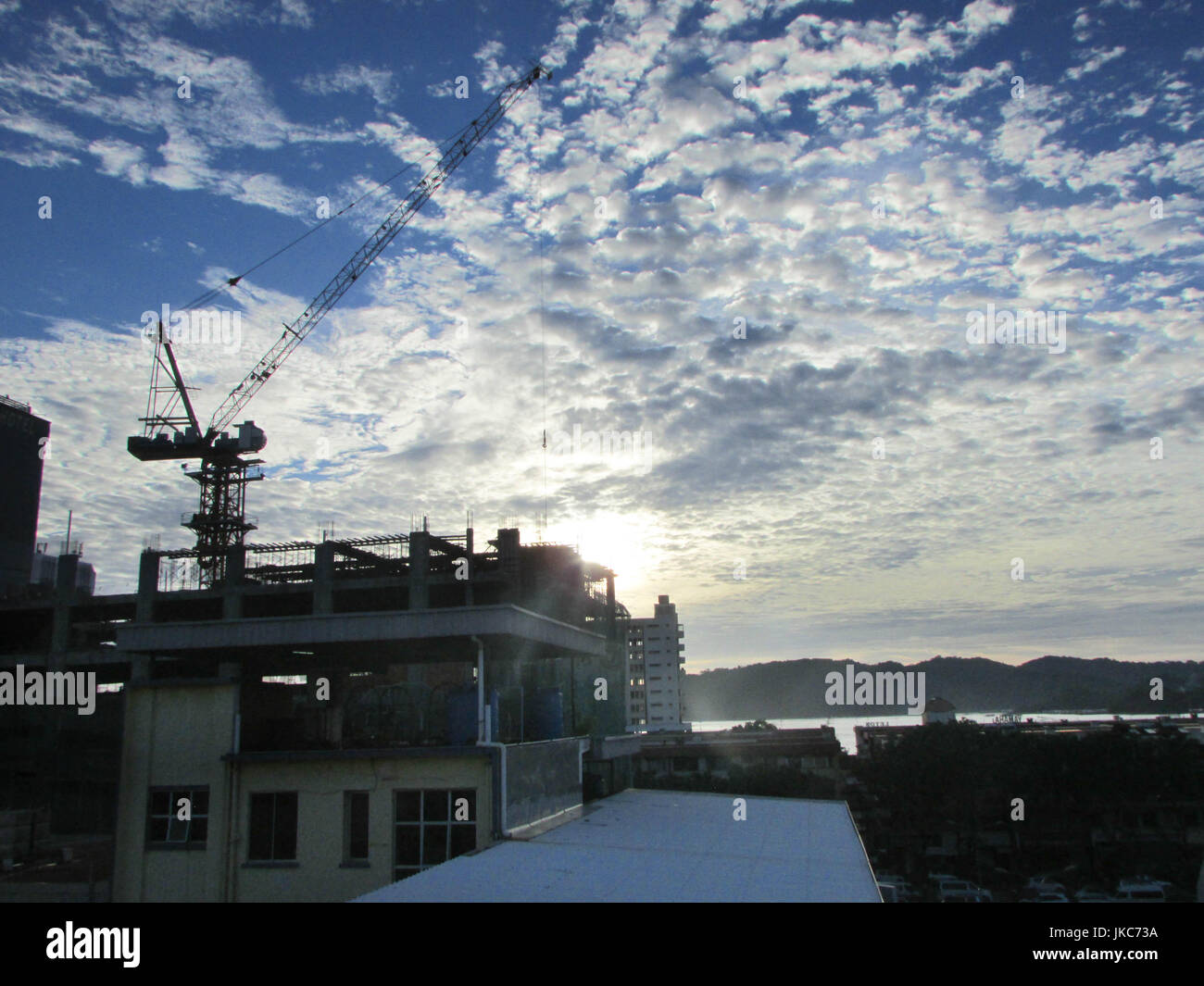 Red crane in foreground hi-res stock photography and images - Alamy