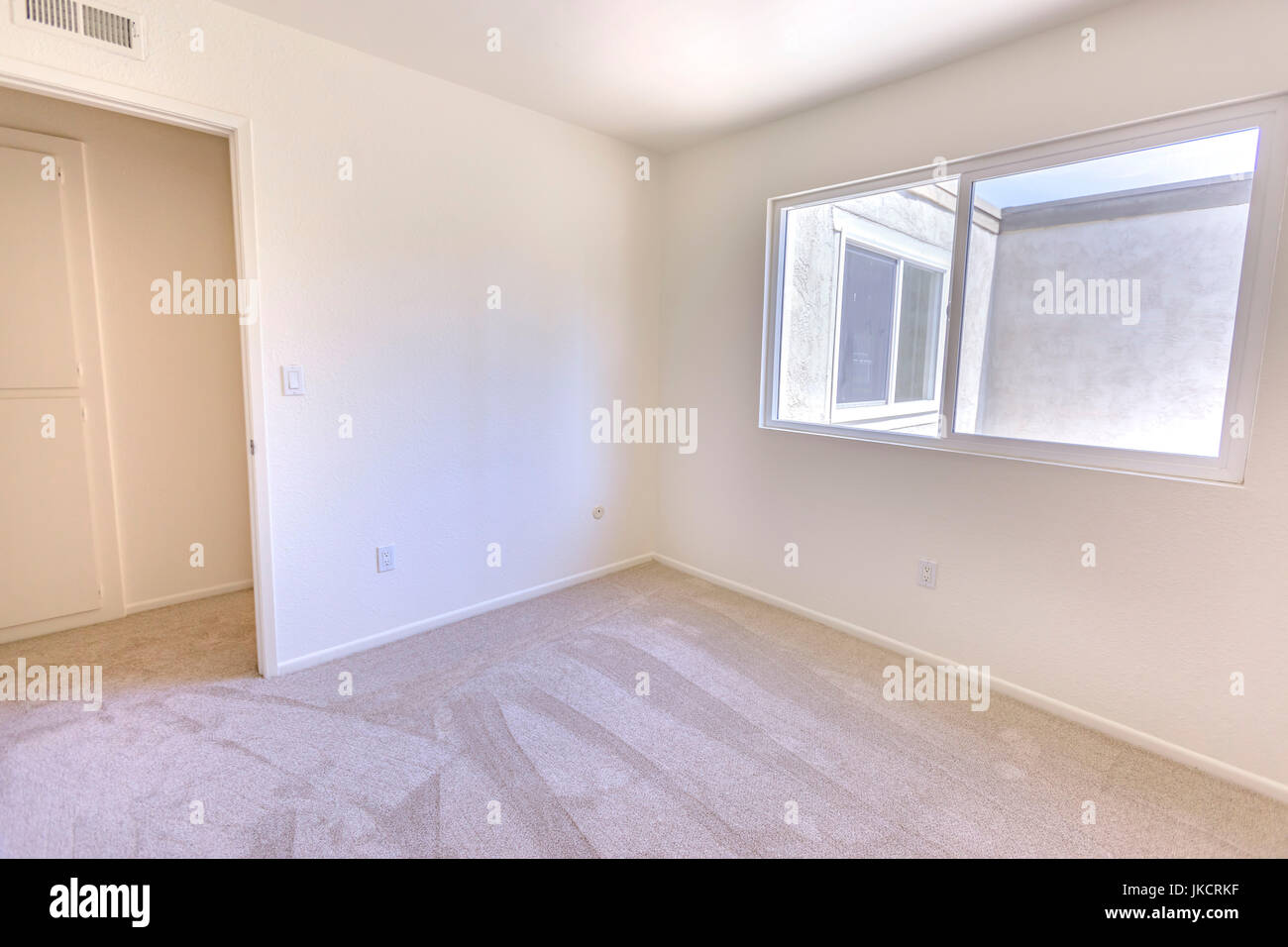 Empty bedroom in a model home in southern California Stock Photo - Alamy