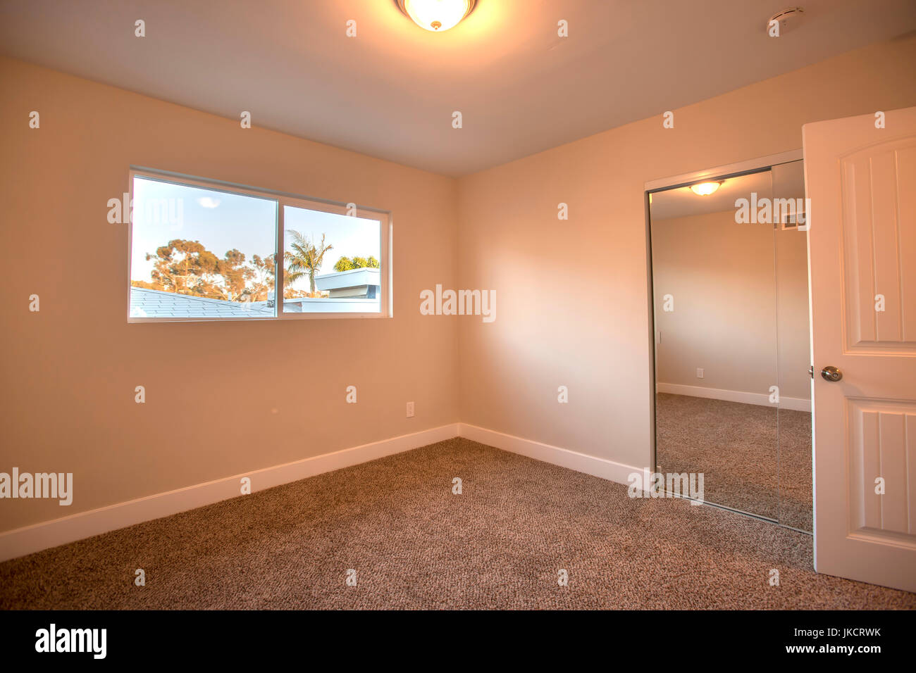 Empty bedroom in a model home in southern California Stock Photo - Alamy
