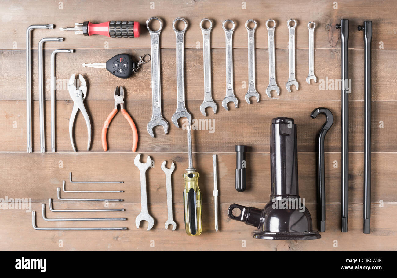 set of tools supplies for repair car on wood background top view ...