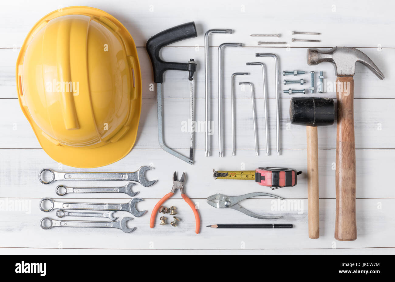 set of tools supplies on wood background top view. construction ...