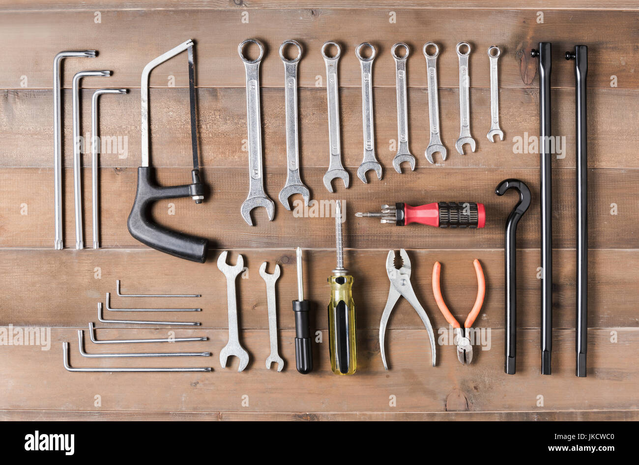 set of tools supplies on wood background top view. construction ...