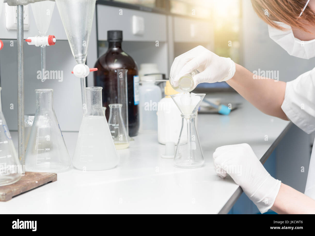 Scientist working in laboratory, testing samples, science technology ...
