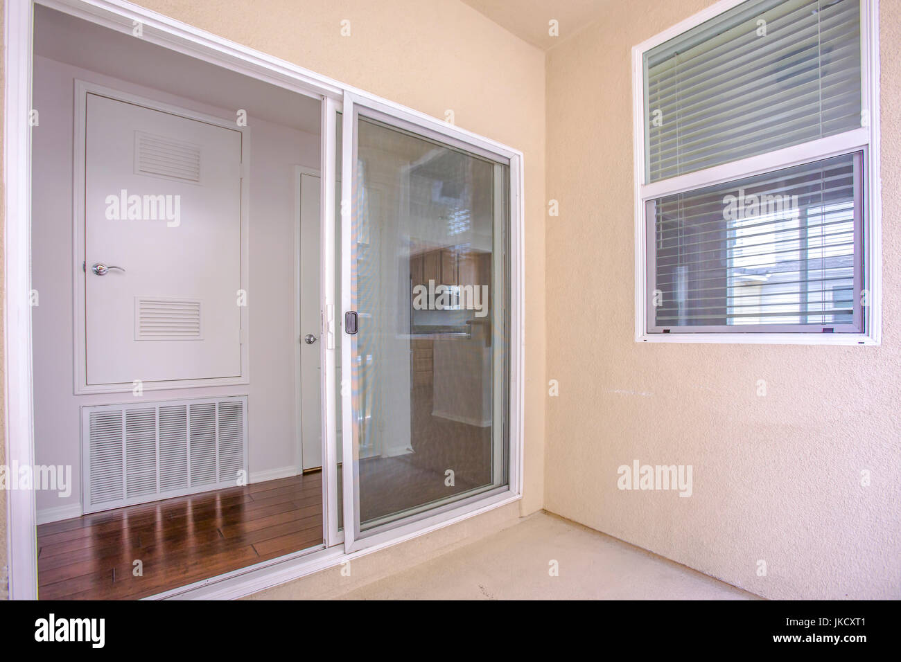Doors to the house and a view of both inside and outside Stock Photo ...