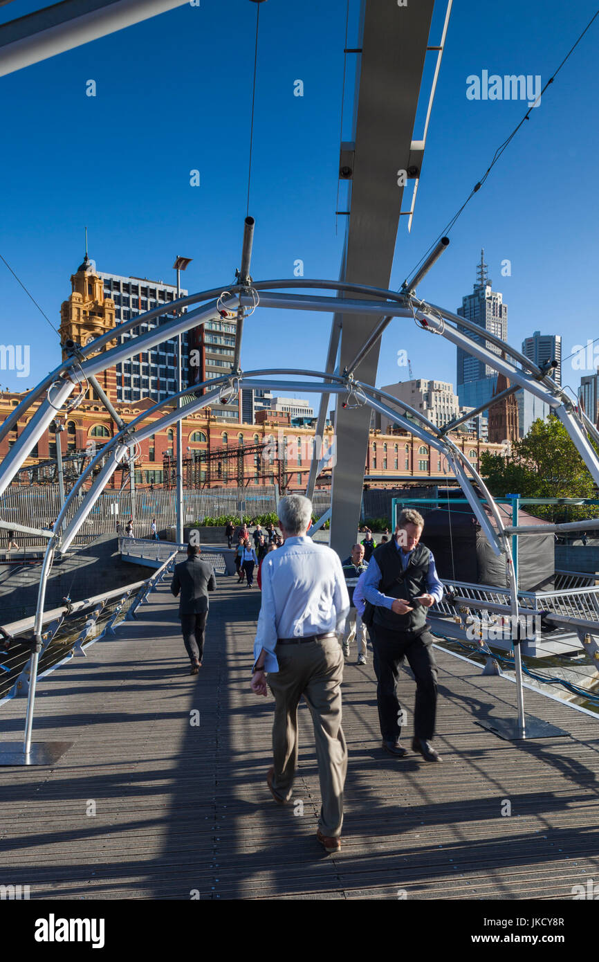 Australia, Victoria, VIC, Melbourne, Yarra River footbridge and skyline ...