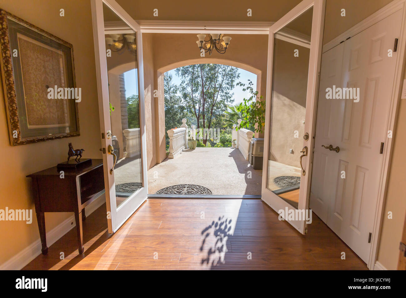 Doors to the house and a view of both inside and outside Stock Photo ...