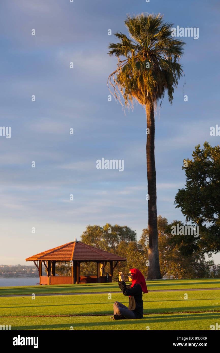 Australia, Western Australia, Perth, Kings Park, Asian woman and palm ...