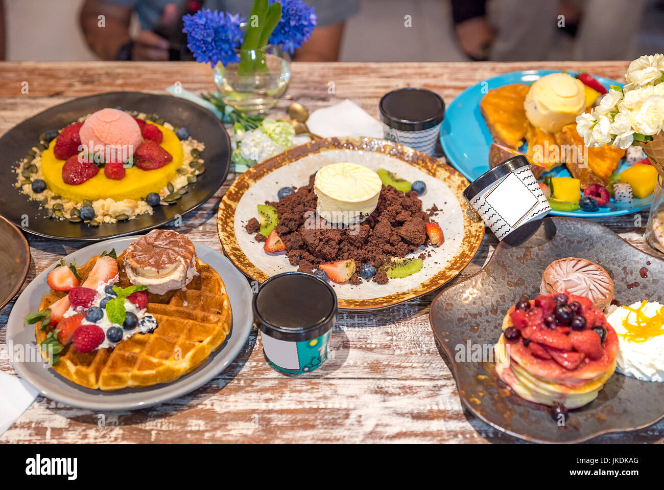 Variety of Dessert on table top view Stock Photo - Alamy