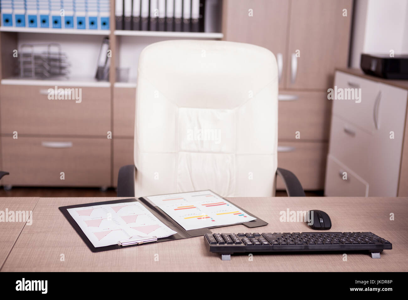 Charts of business on table on office Stock Photo - Alamy