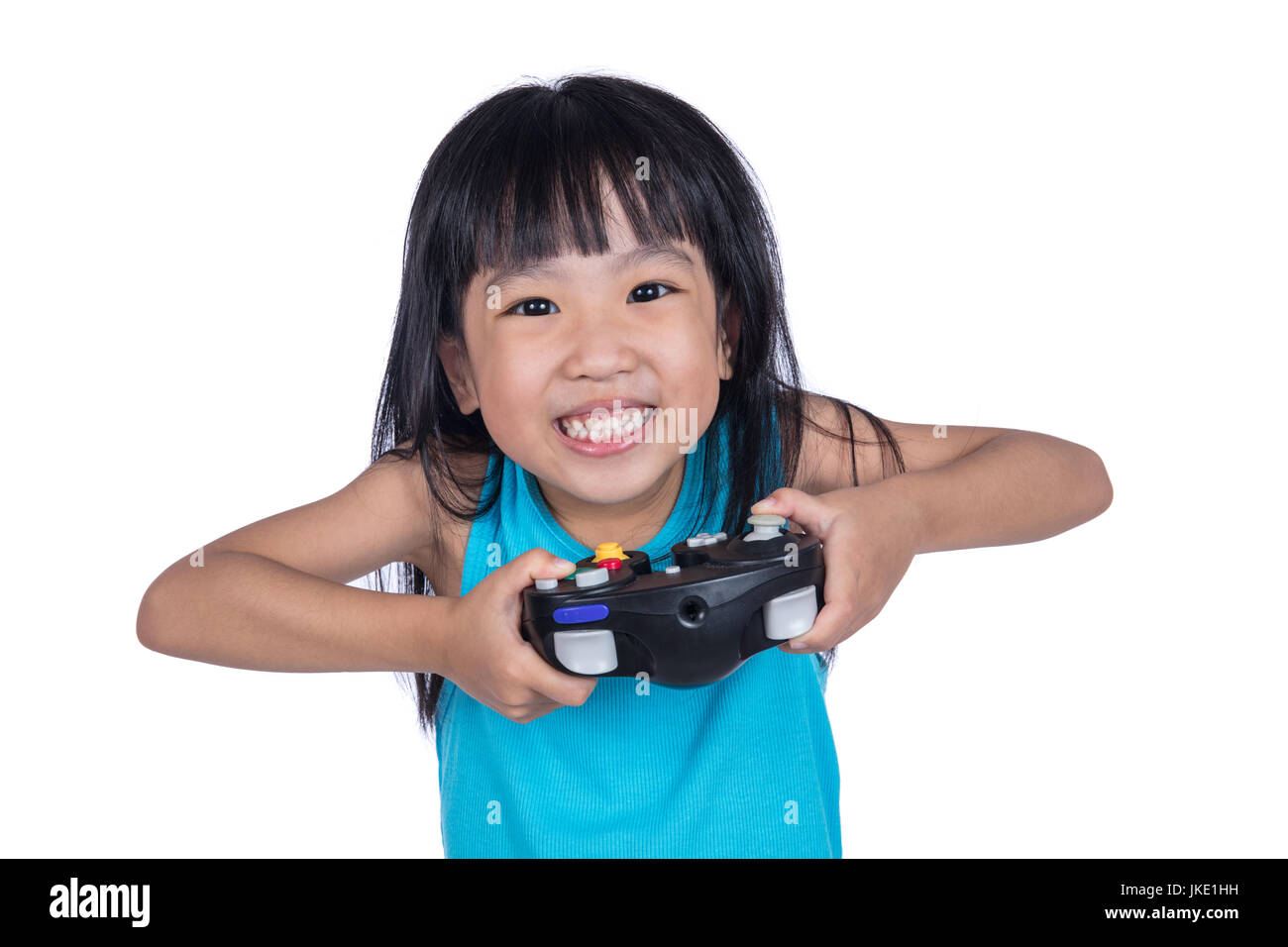 Asian Chinese little girl playing game with controller in isolated ...