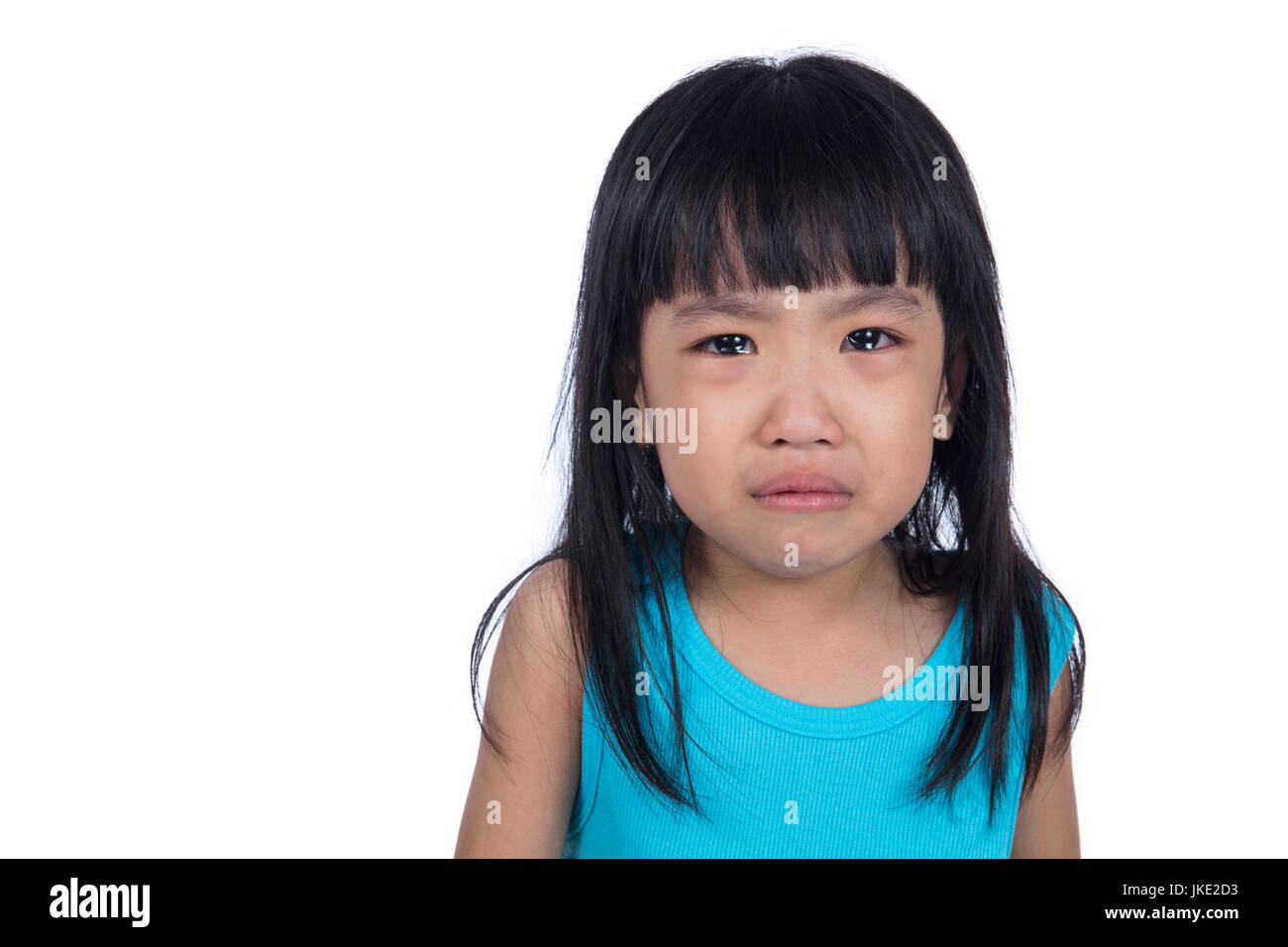 Crying Asian Chinese little girl in isolated white background Stock ...