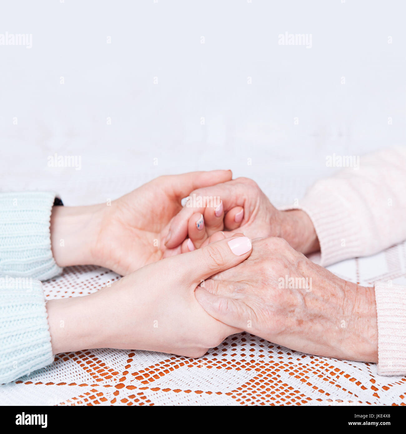 Helping hands, care for the elderly concept Stock Photo - Alamy