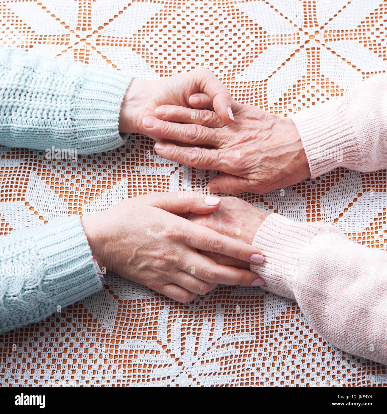 Helping hands, care for the elderly concept Stock Photo - Alamy
