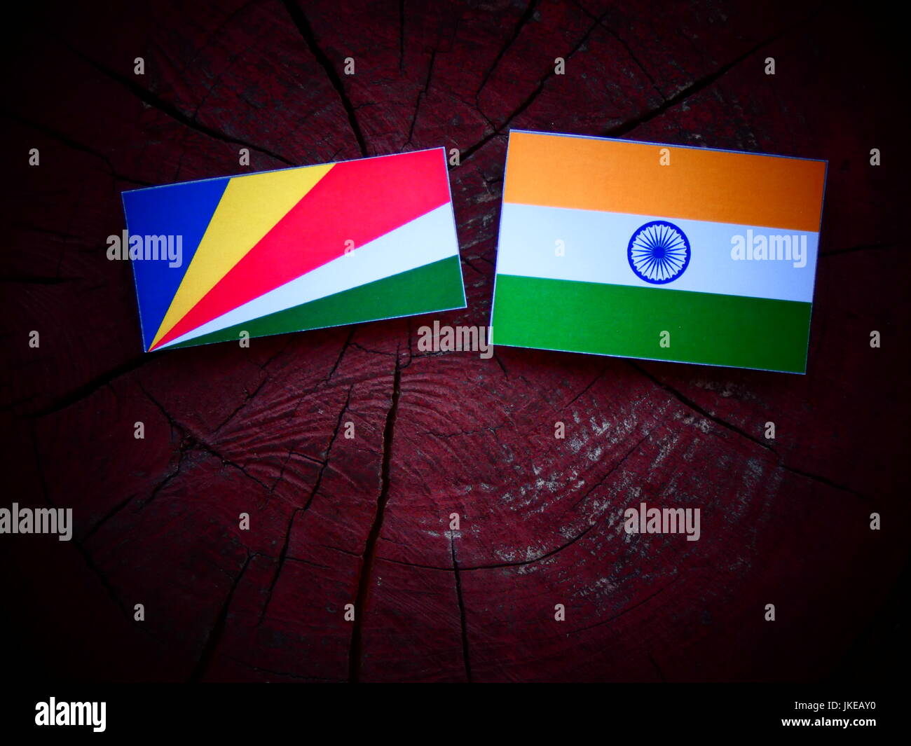 Seychelles flag with Indian flag on a tree stump isolated Stock Photo ...