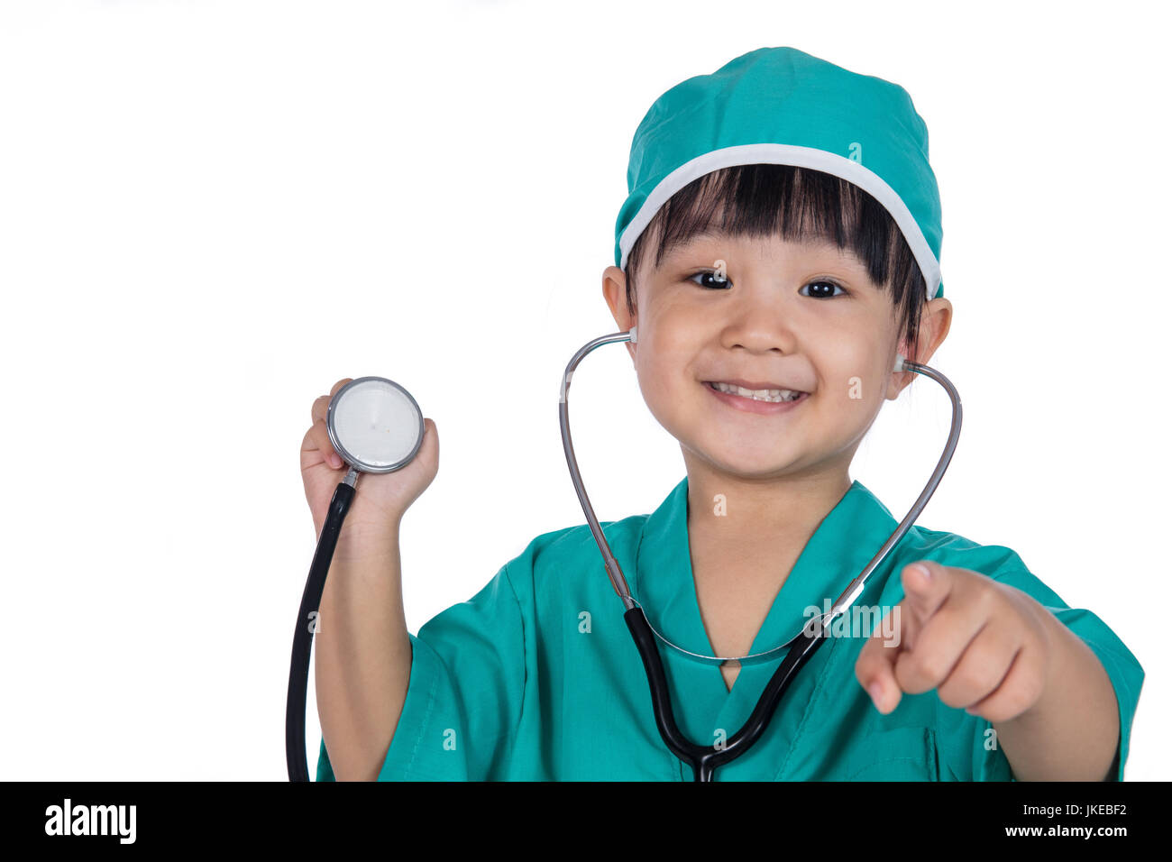 Asian Little Chinese Girl Playing Doctor with a stethoscope in isolated ...