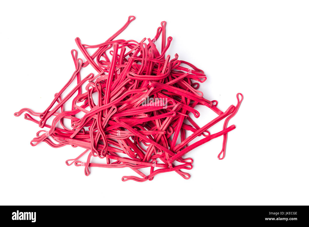 Bunch of red rubber bands isolated on white Stock Photo - Alamy