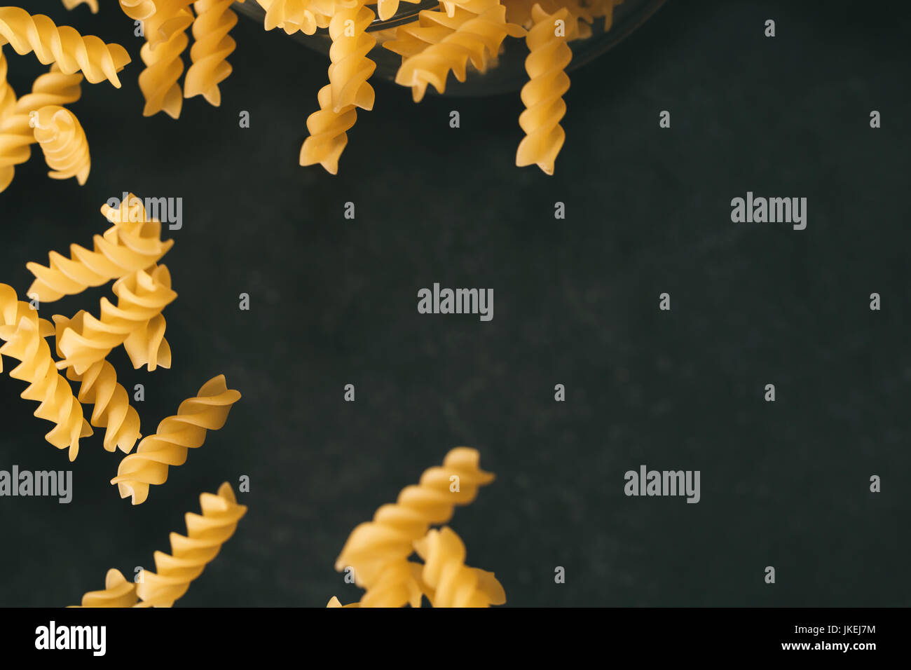 Flying pasta on dark background. Food motion Stock Photo - Alamy