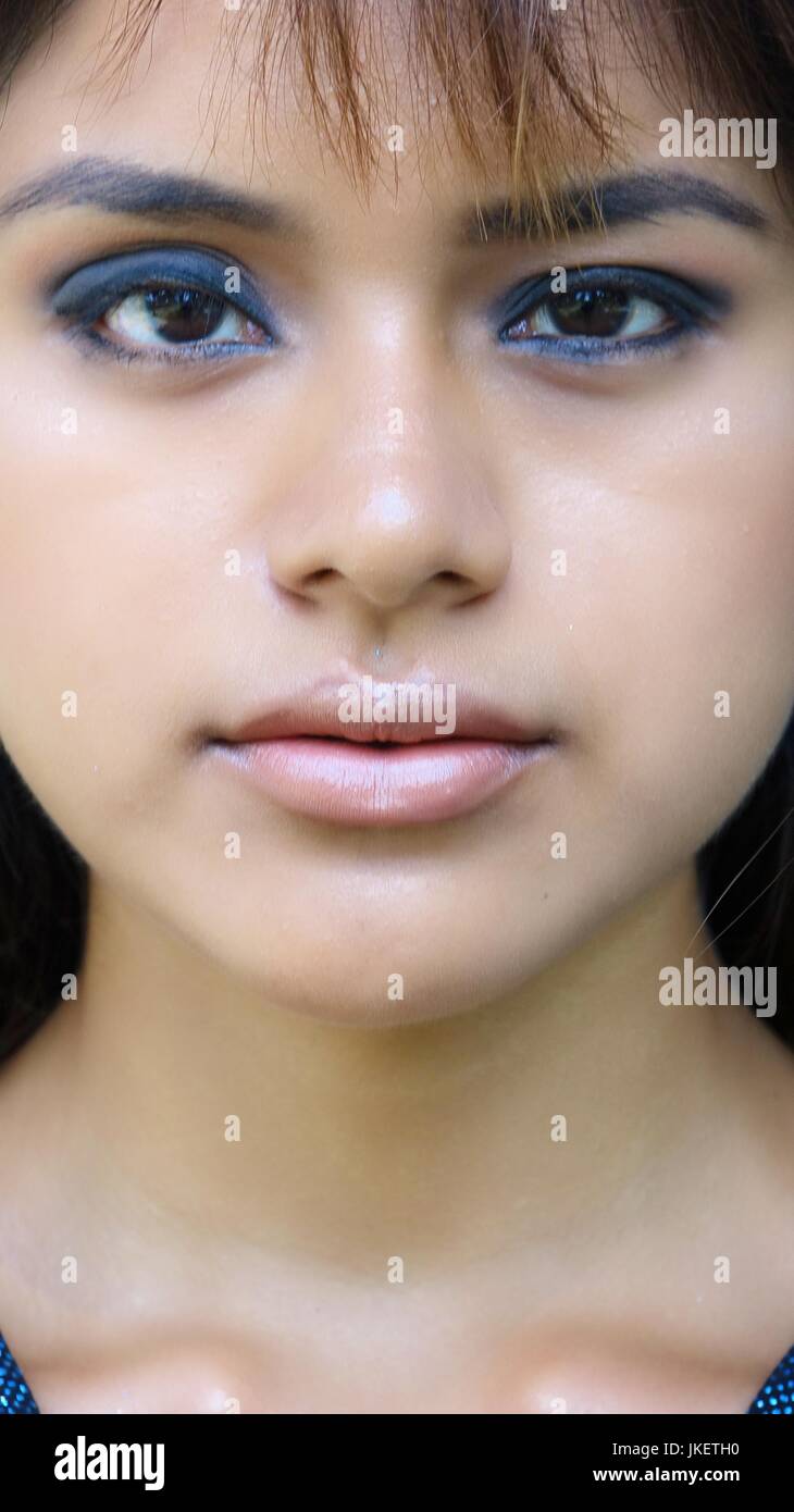 Youthful Peruvian Girl Face Stock Photo - Alamy