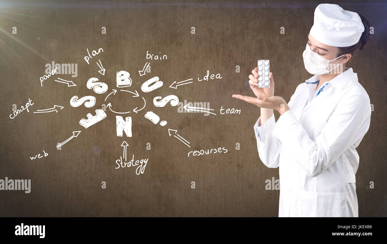 Beautiful medical woman doctor in uniform. Studio painted background ...