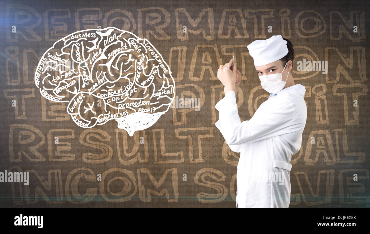Beautiful medical woman doctor in uniform. Studio painted background ...