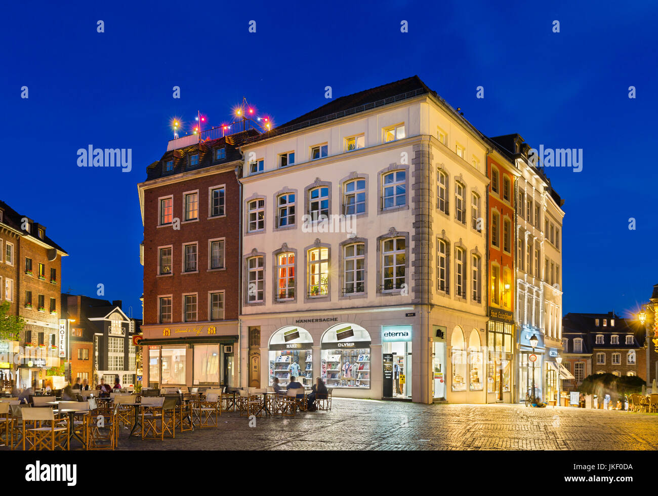 AACHEN - JUNE 05: Stores and restaurants at the market square of Aachen ...