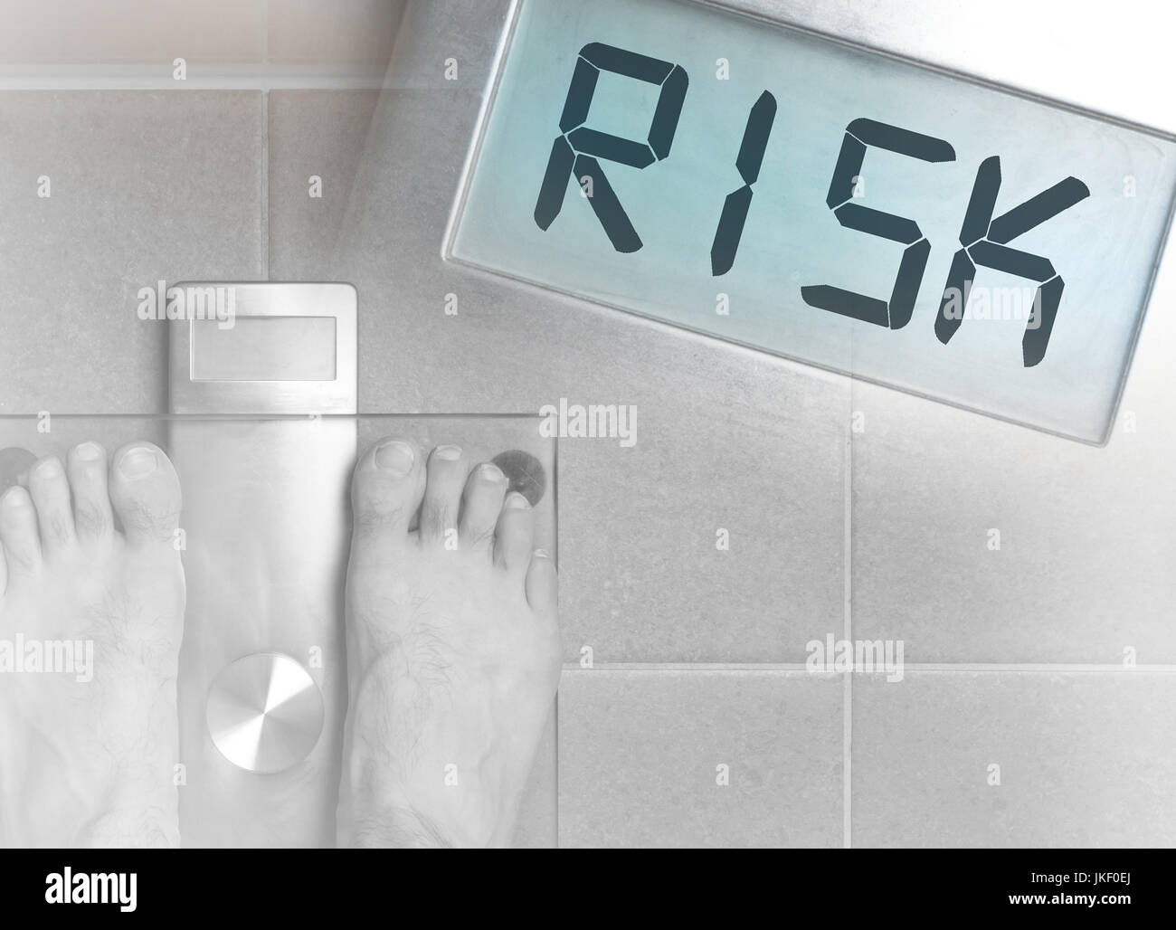 Closeup of man's feet on weight scale - Risk Stock Photo - Alamy