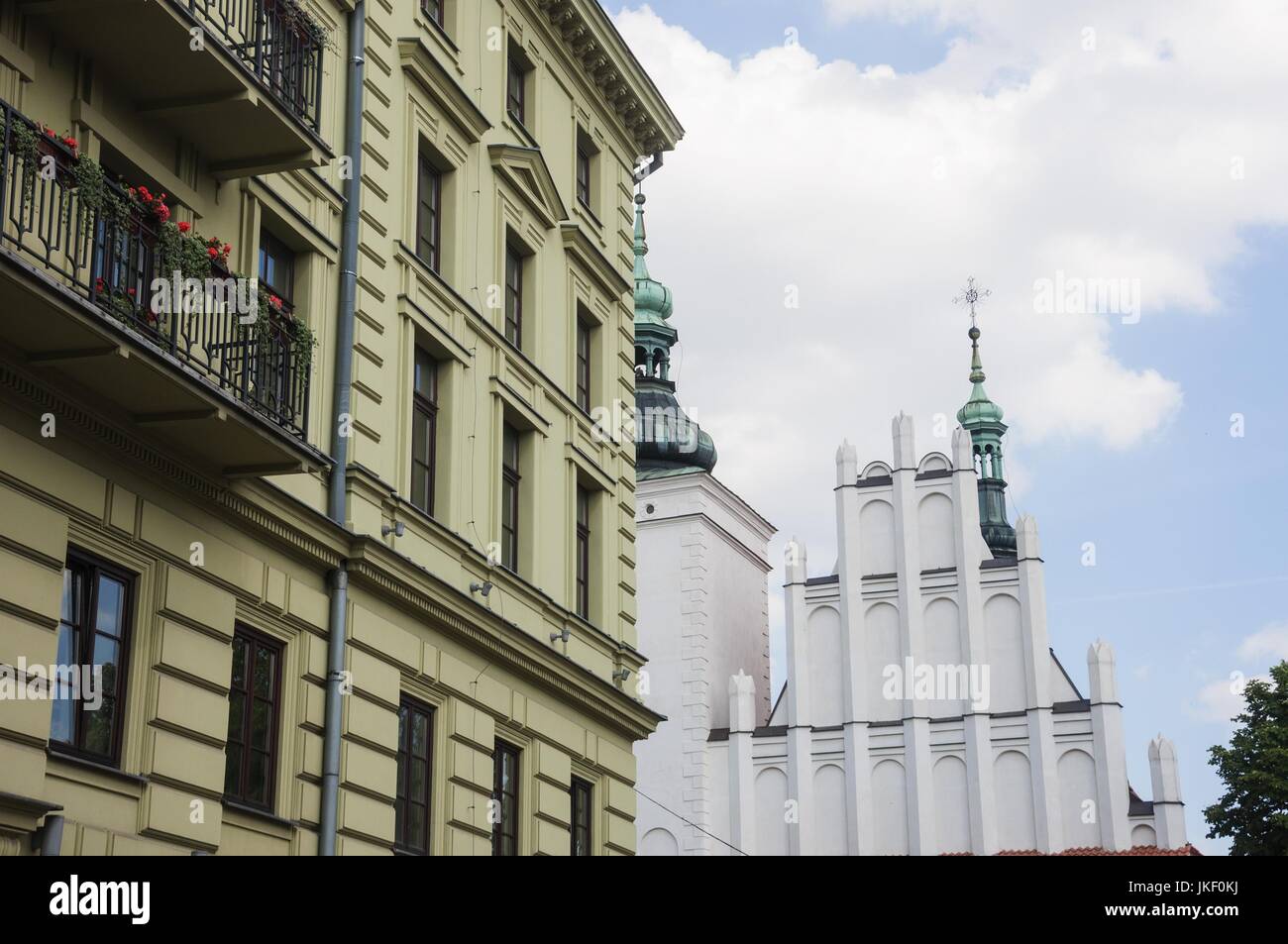 a facade old old towns building with church in the background Stock ...