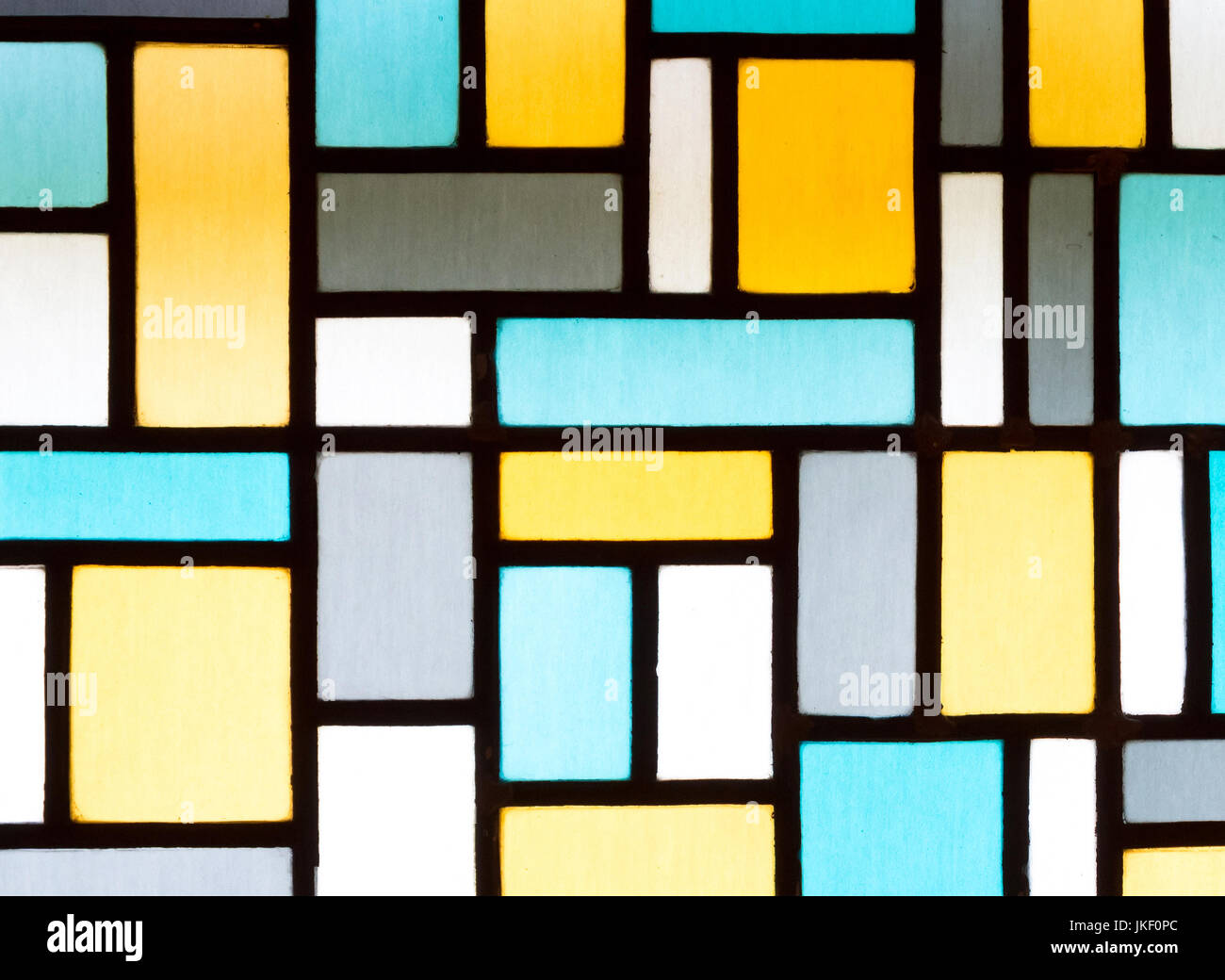 Image of a multicolored stained glass window with irregular block ...
