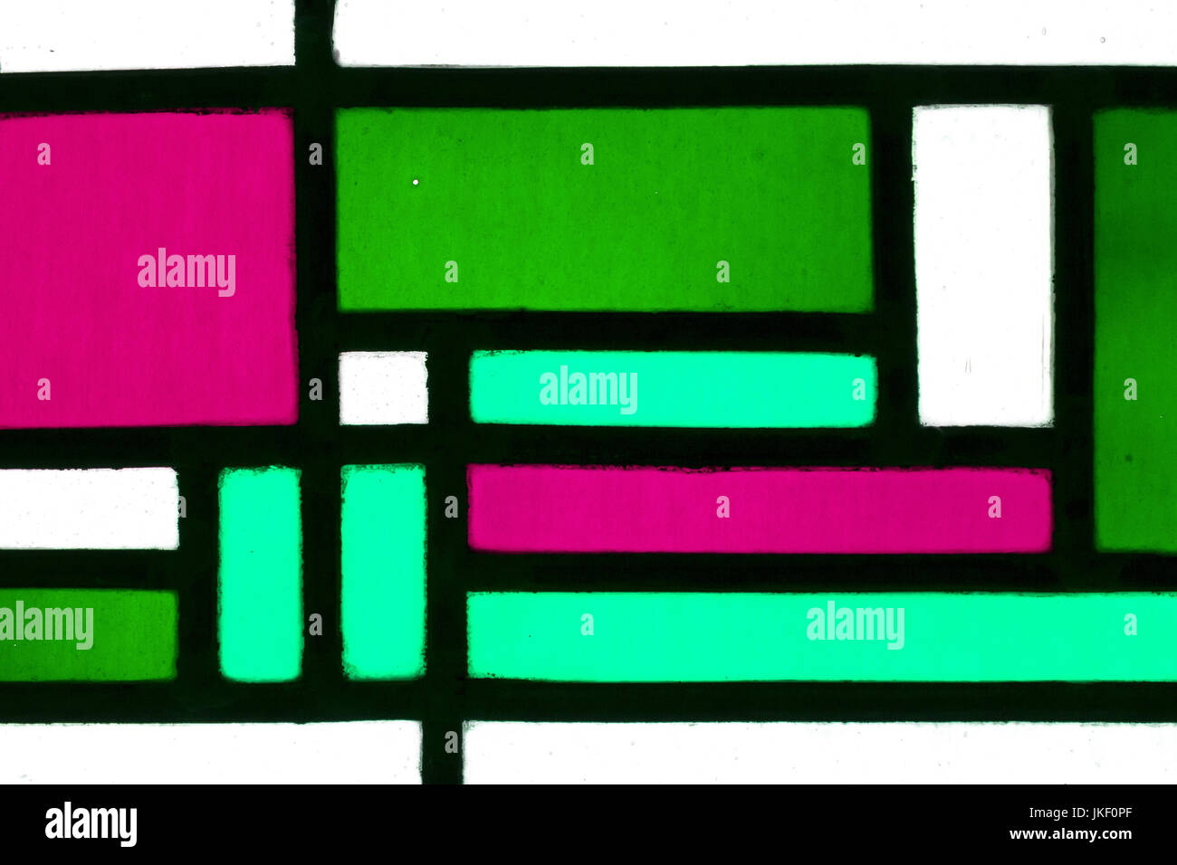 Image of a multicolored stained glass window with irregular block ...