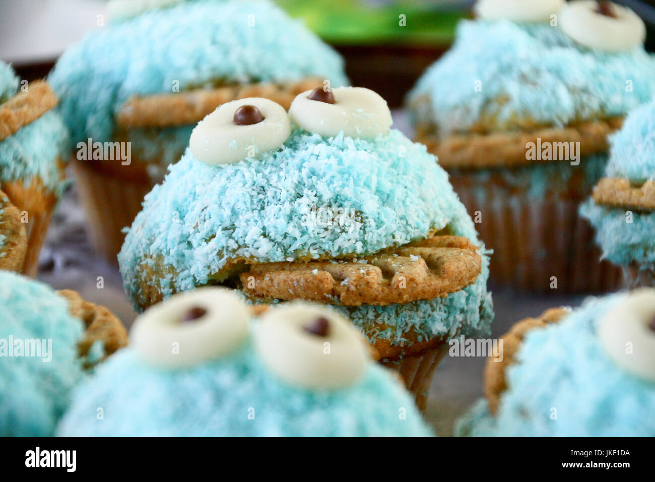 blue Muffin monster with cookie mouth Stock Photo - Alamy